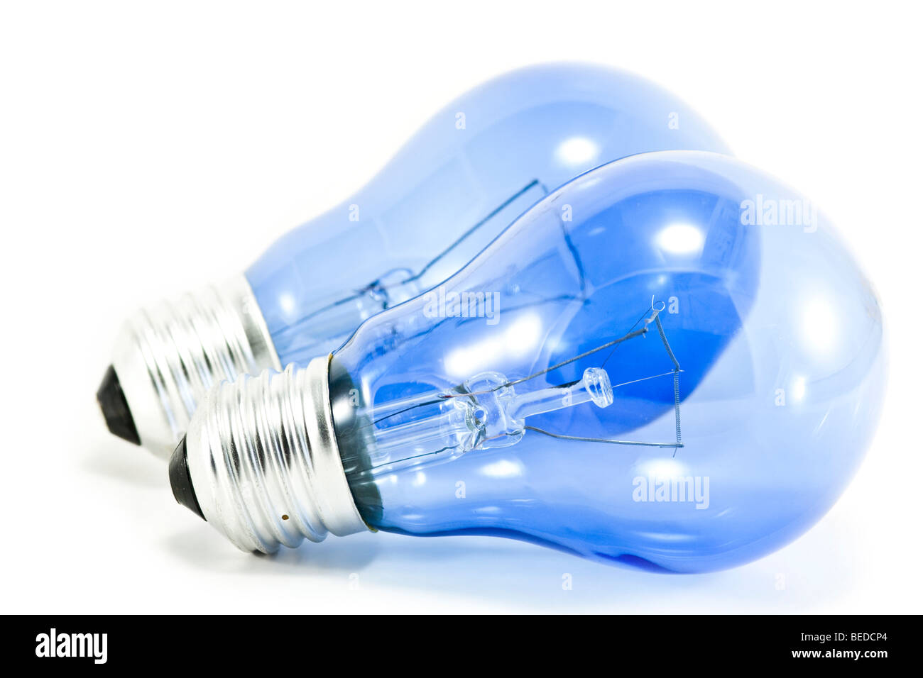 Two daylight blue light globes isolated on white Stock Photo - Alamy