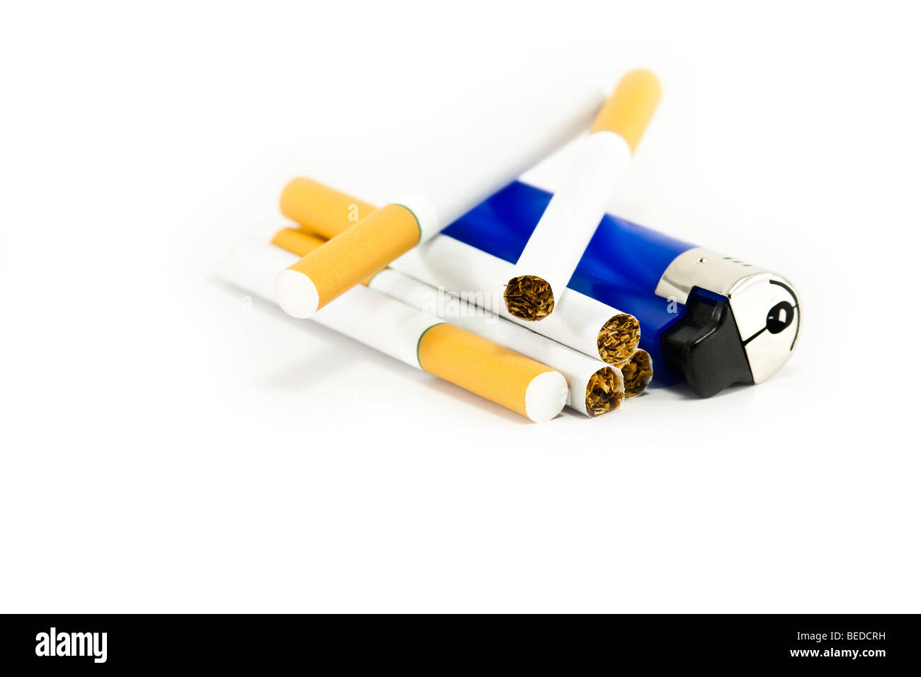 Cigarettes and a lighter isolated on white Stock Photo - Alamy