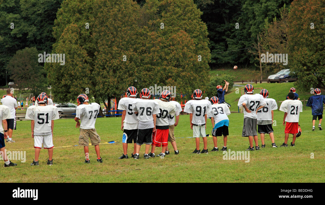 A line of young men in American football kits Stock Photo - Alamy