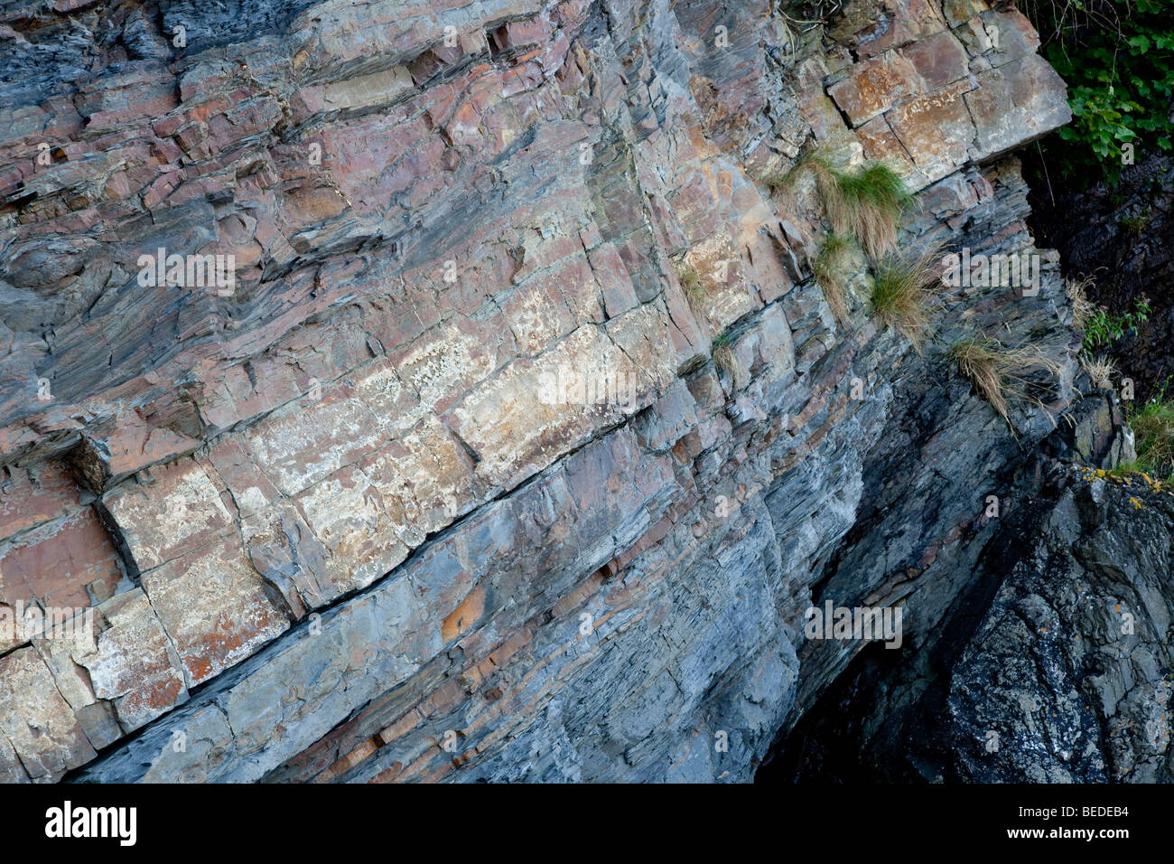 Strata between layers of rock Stock Photo - Alamy