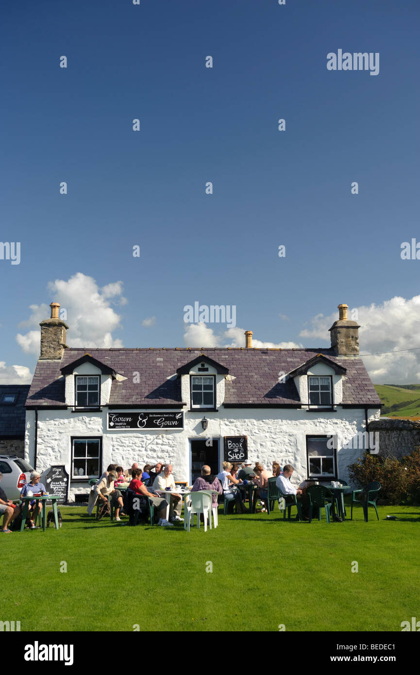 People sitting outside the Town and Gown tearooms and bookshop, sunny ...