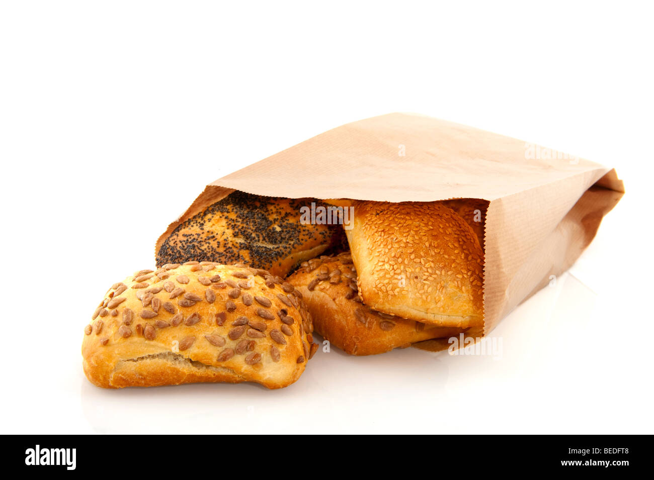 Luxury bread rolls in bag with grain isolated over white Stock Photo ...