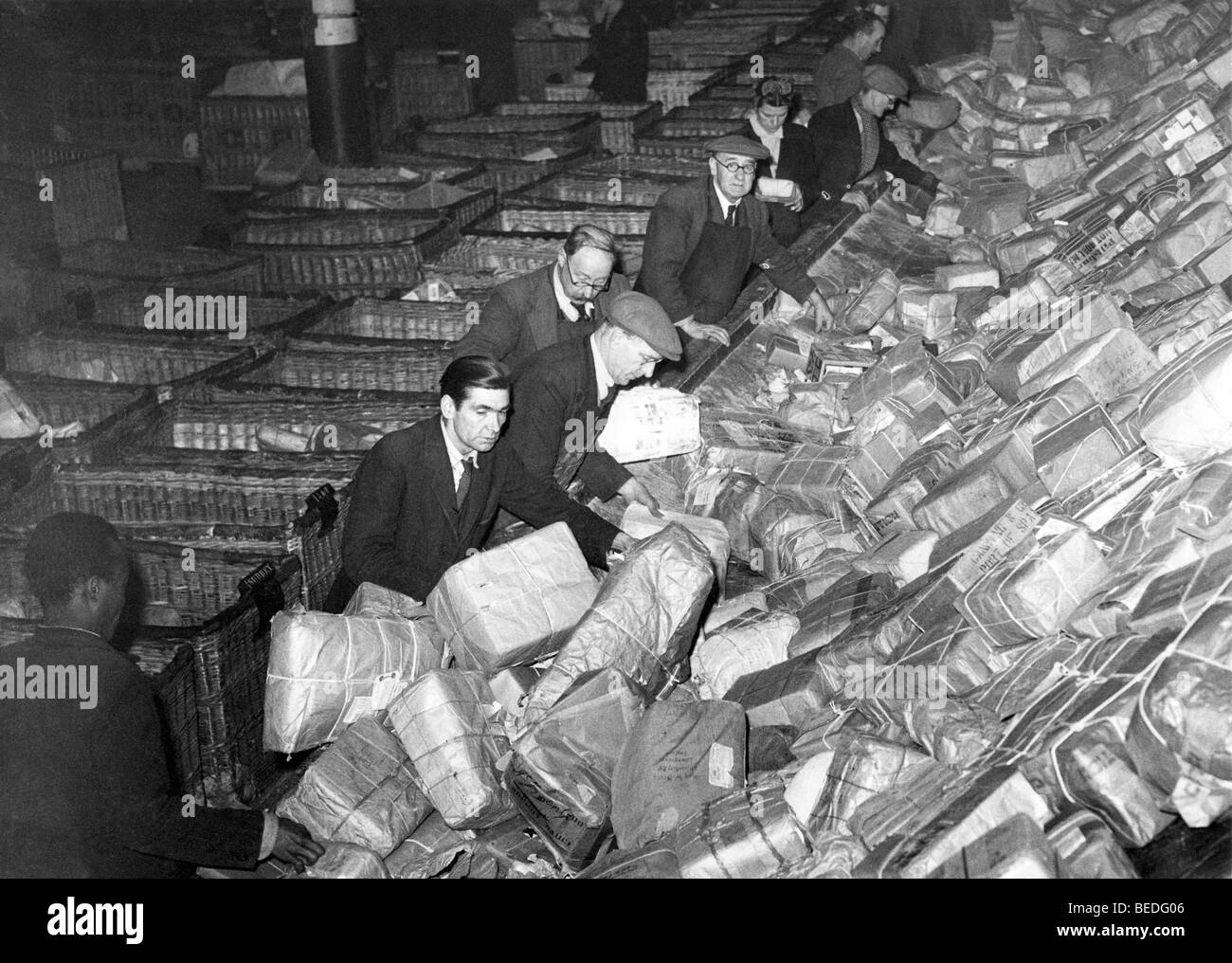 Historic photograph, postal workers sorting packages, around 1925 Stock ...