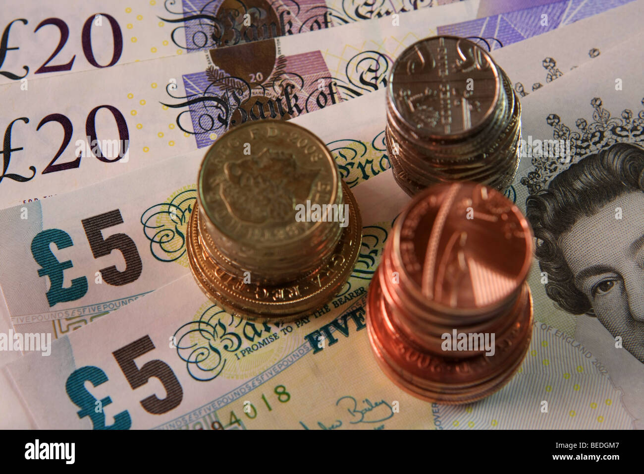 sterling notes and coins Stock Photo - Alamy