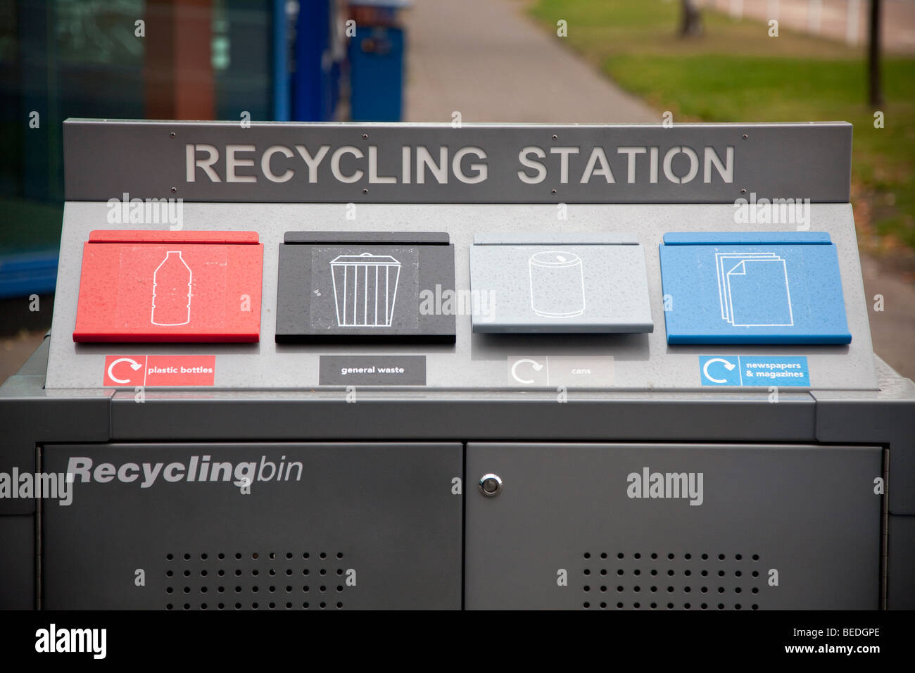 A recycling station with four bins Stock Photo - Alamy