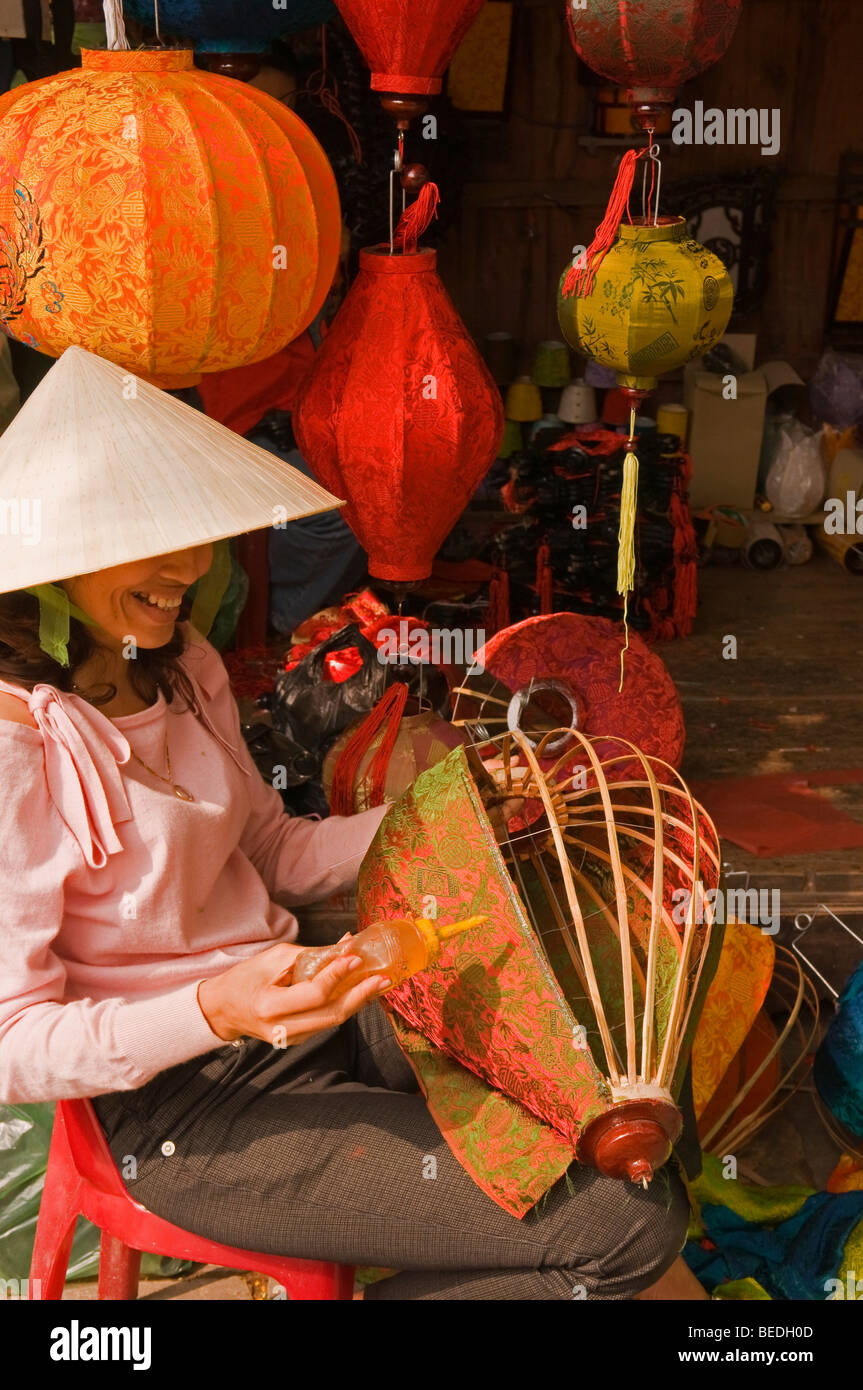 Trader preparing lanterns Stock Photo - Alamy