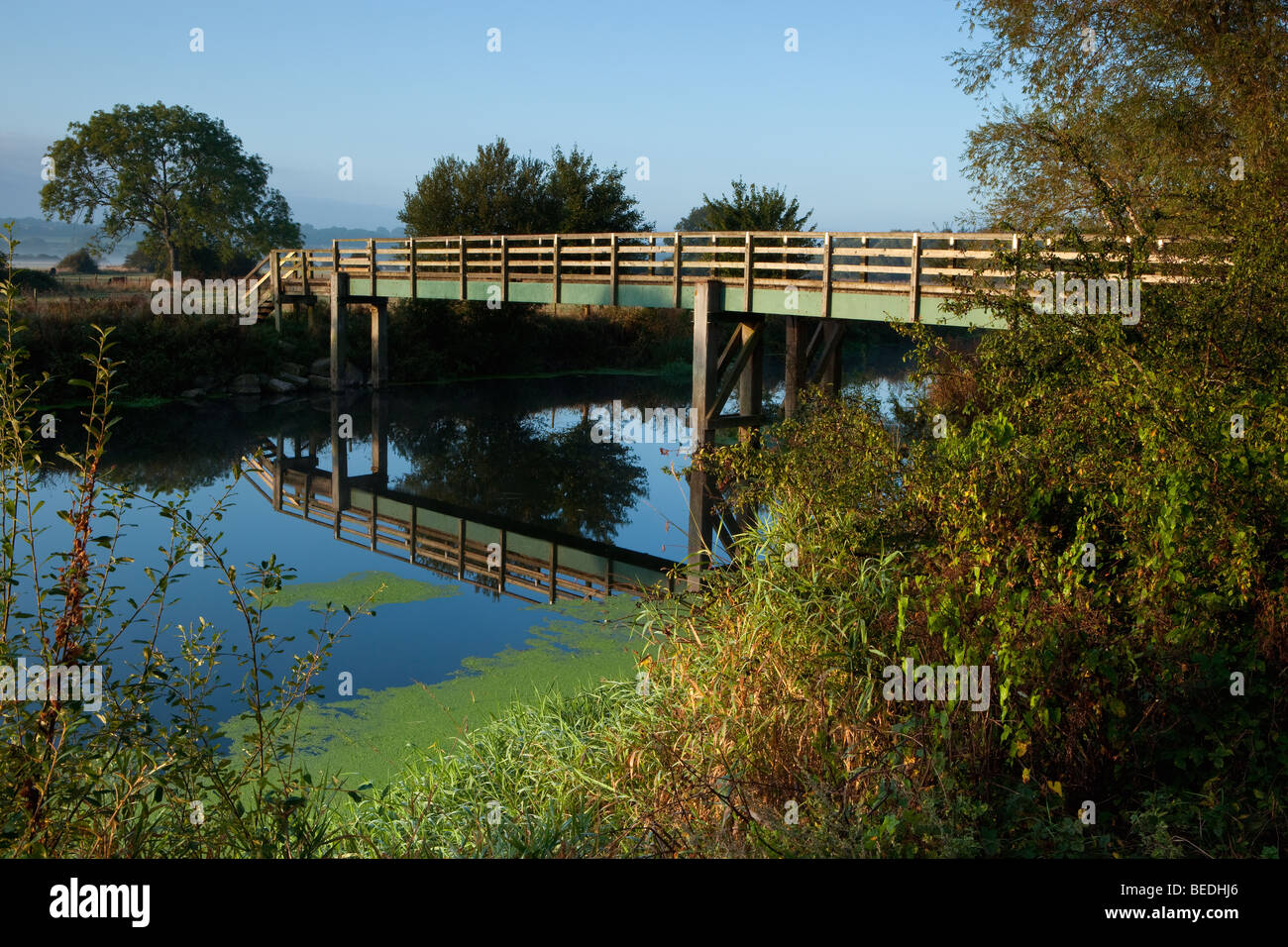 Autumn dawn on the River Stour at the EyeBridge, Pamphill nr. Wimborne ...