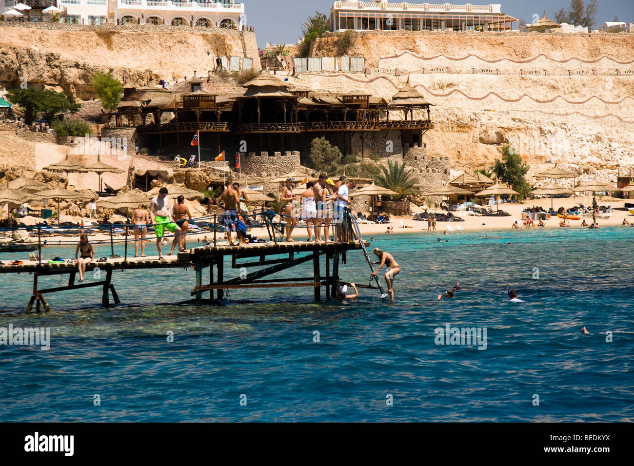 Holiday makers snorkelling from a jetty, Hadaba, Sharm el Sheikh, Red ...