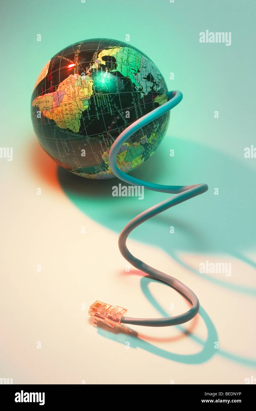 Network cable and globe Stock Photo - Alamy