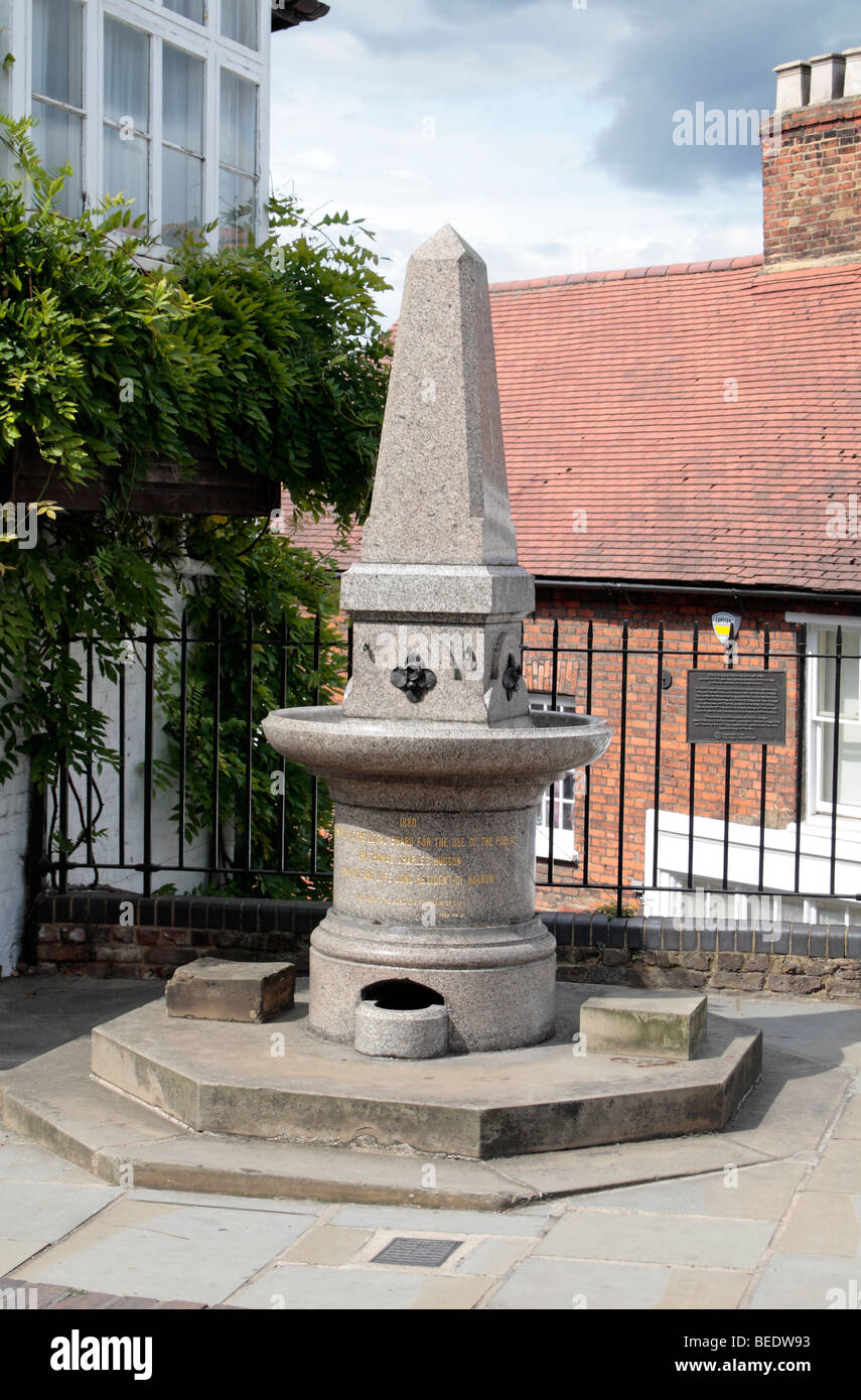A traditional stone village drinking well & fountain, erected in 1880 ...