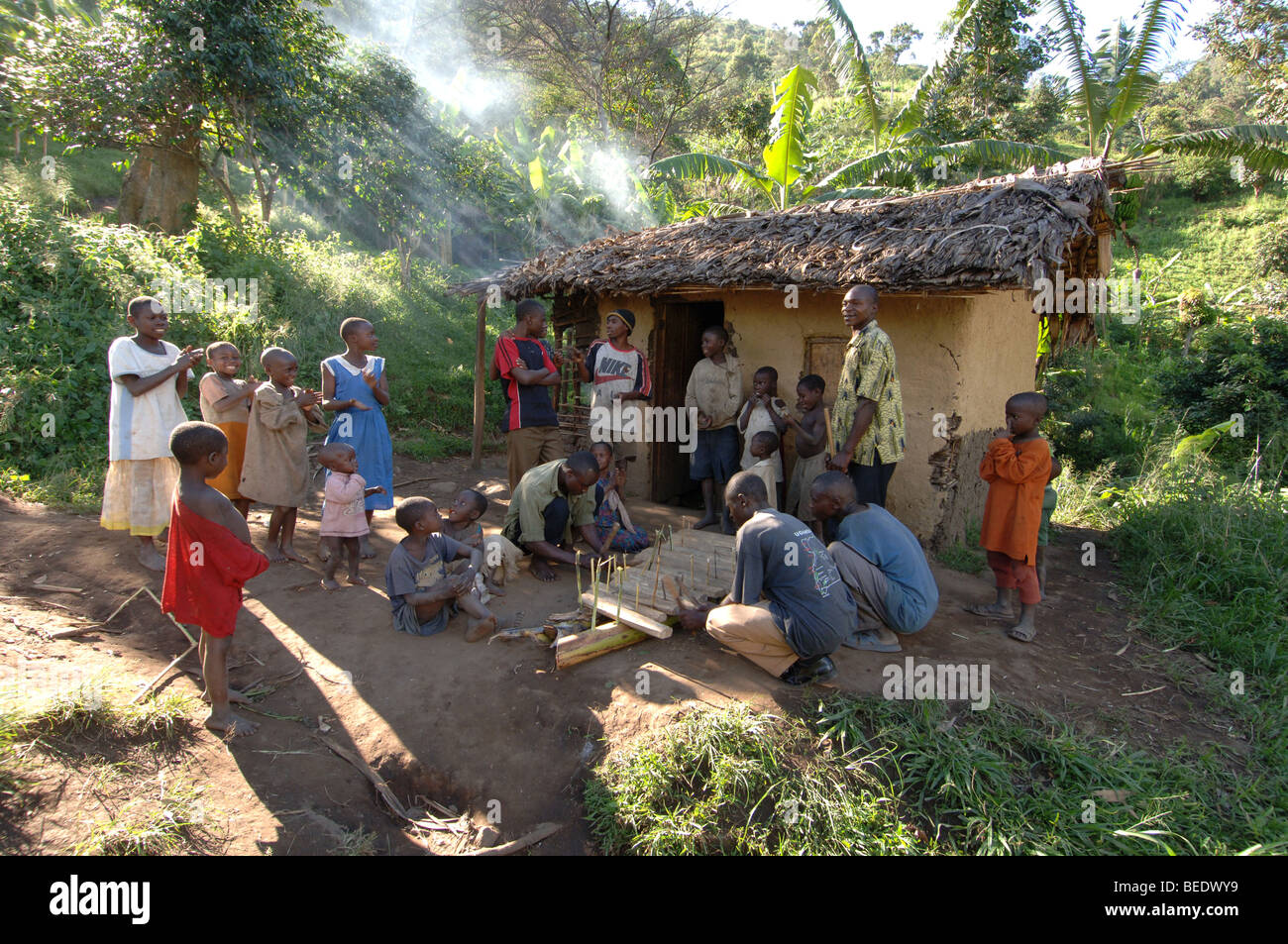 Bakonzo village hanging out in the centre playing music on the ...