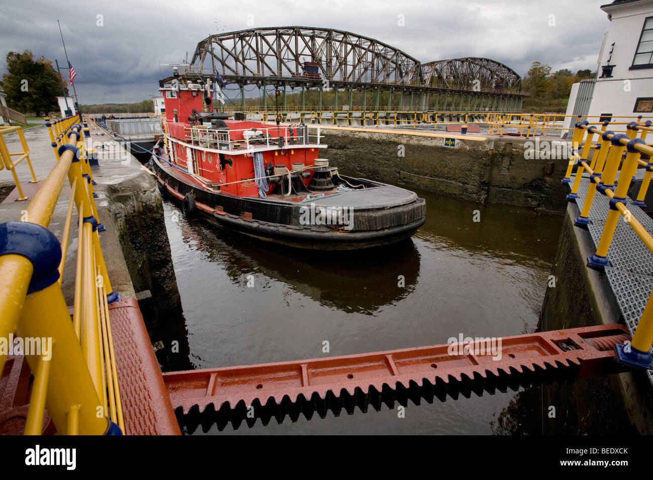 The tug boat Crow pushing two work barges westbound into lock 15 at ...