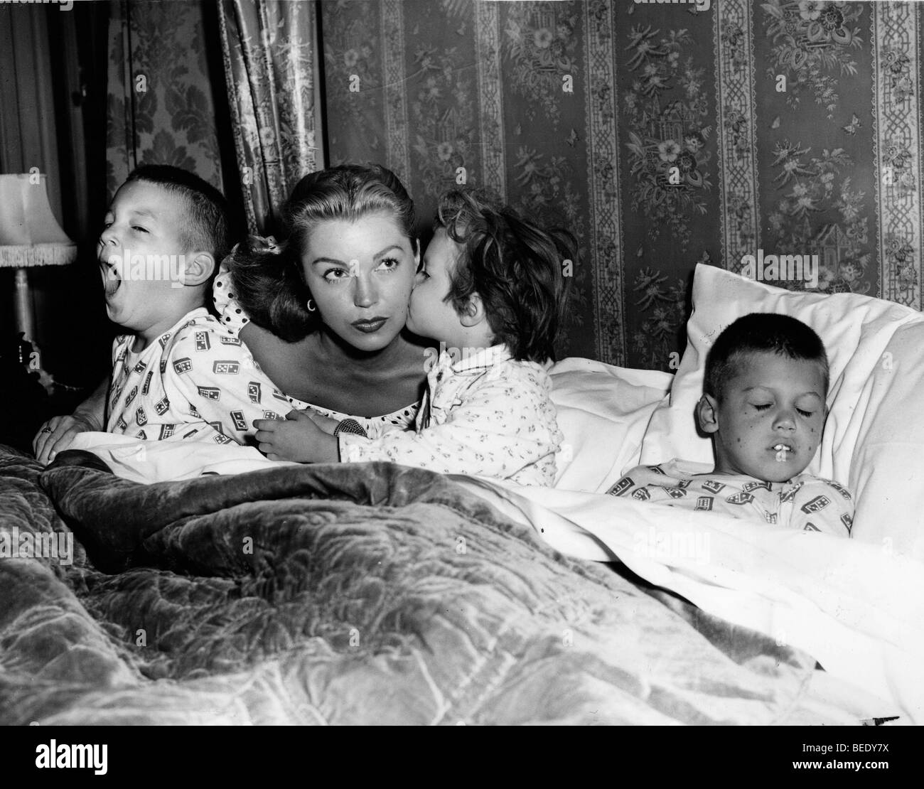 Actress Esther Williams getting ready for bed with her three children ...