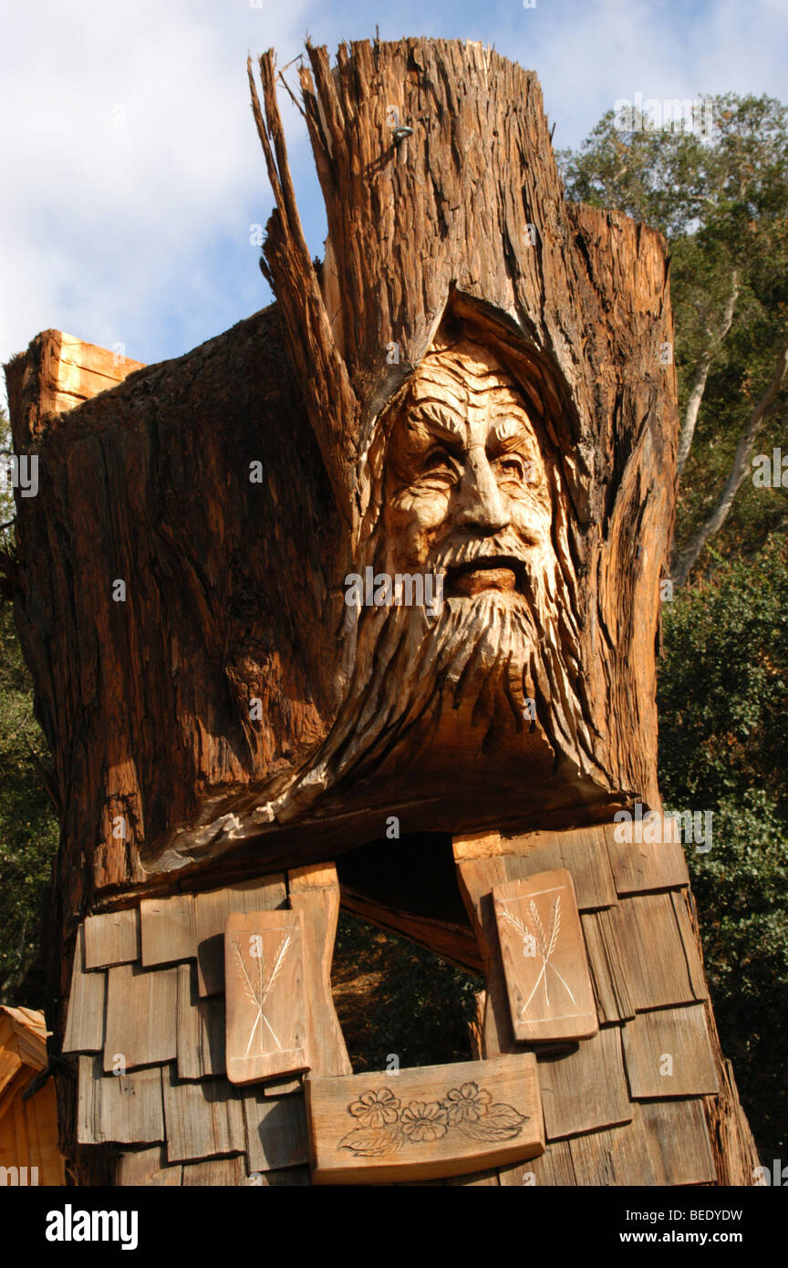 Face carved out of wood at Itsyville, near Salinas California Stock ...