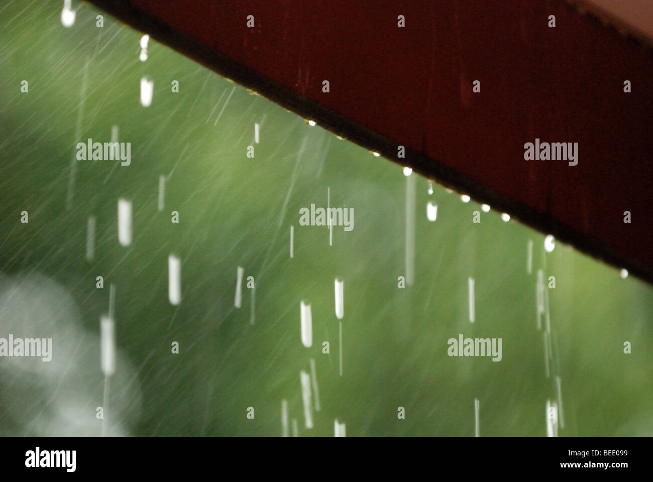 Raindrops fall from roof hi-res stock photography and images - Alamy