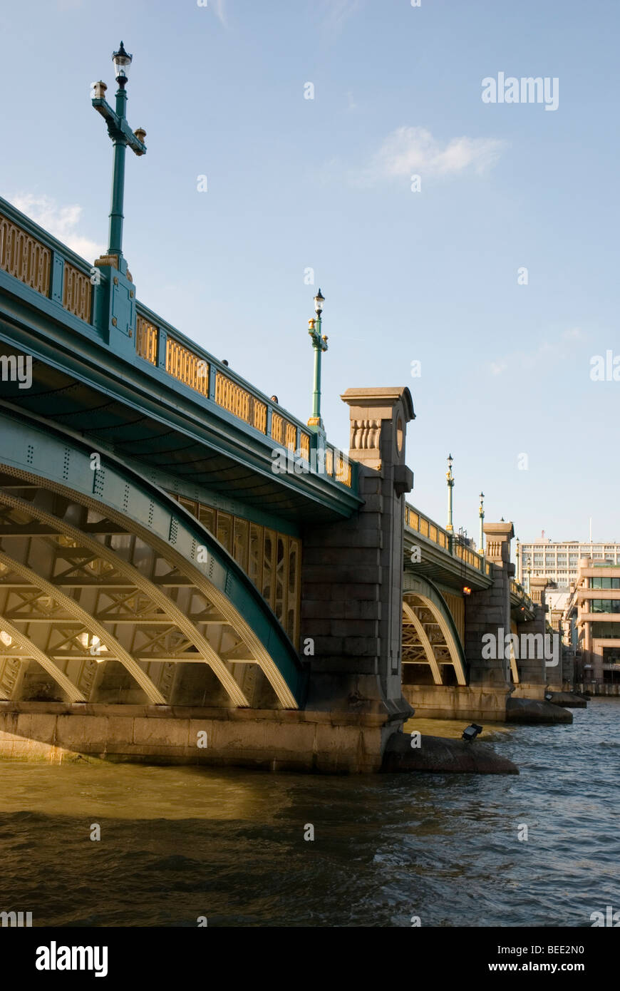 Southwark Bridge across the river Thames from Thames Path in Southbank ...