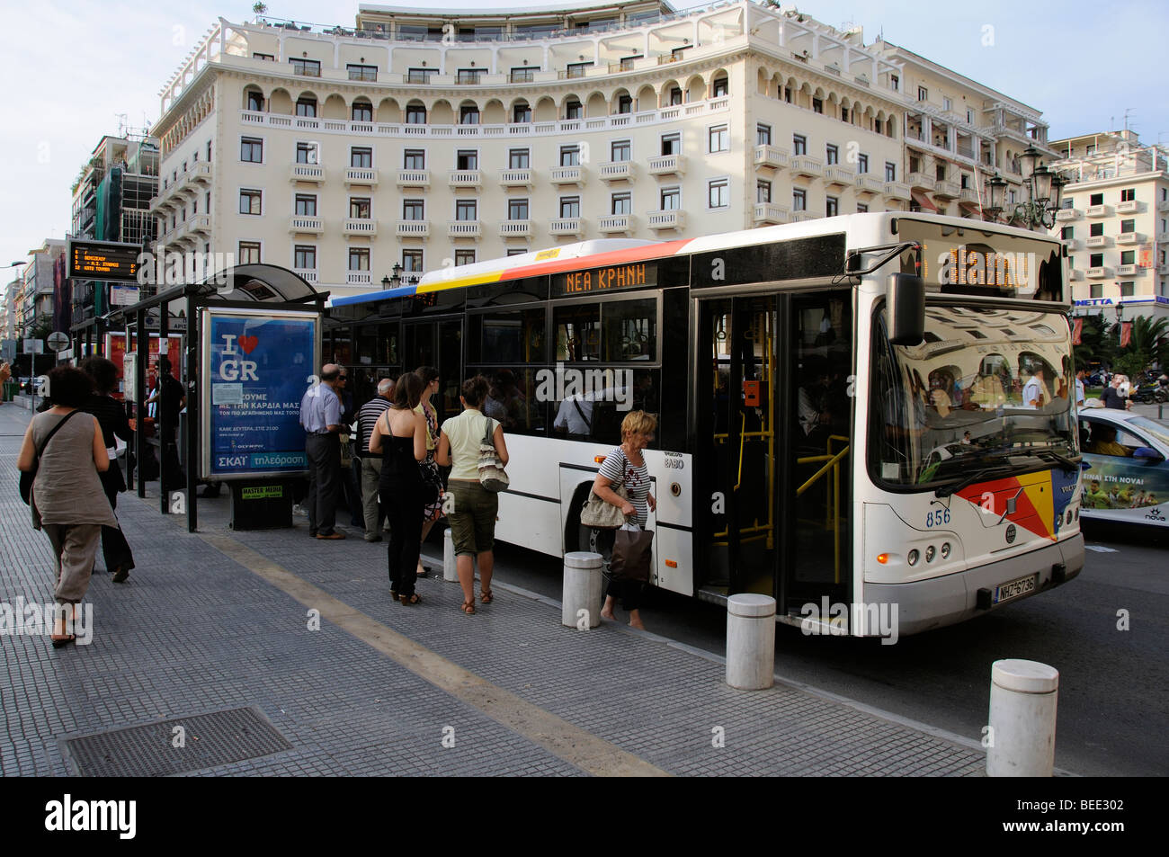 Travellers at a bus stop in central Thessaloniki northern Greece EU ...