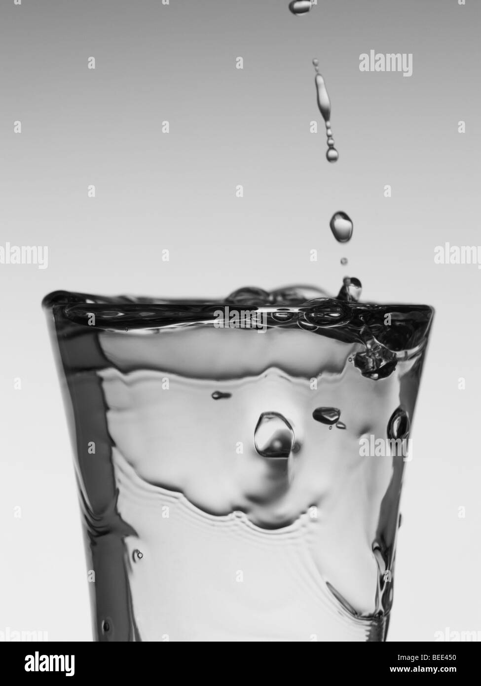 Pouring a shot of vodka Stock Photo - Alamy