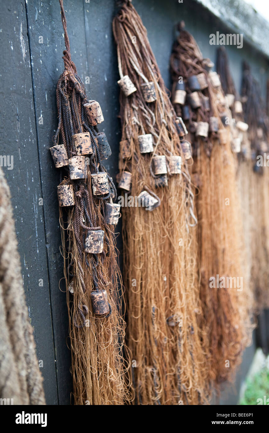 Fishing nets hanging up dry hi-res stock photography and images - Alamy