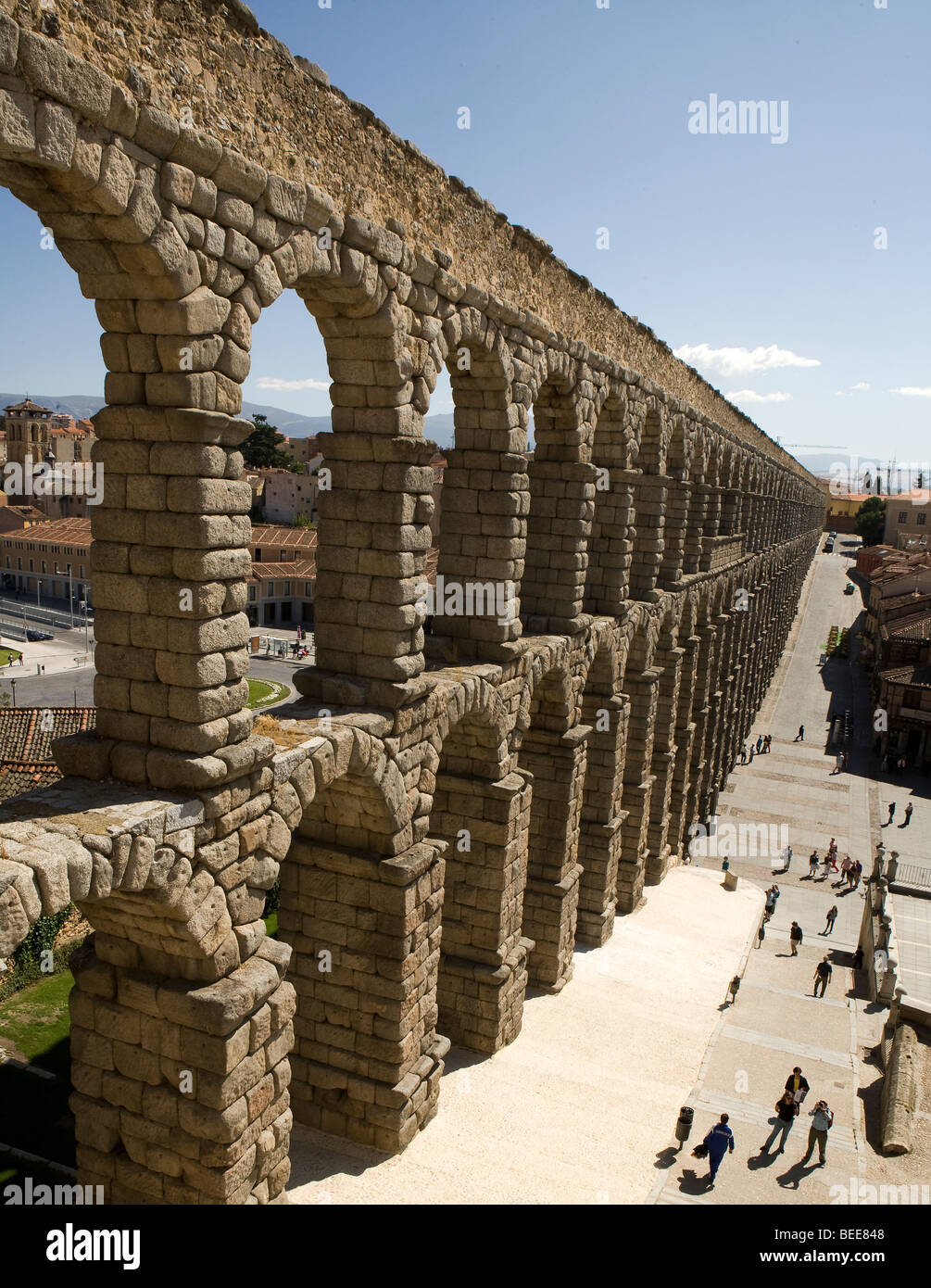 Tourists at Roman water aqueduct, elevated view, Segovia, Spain Stock ...
