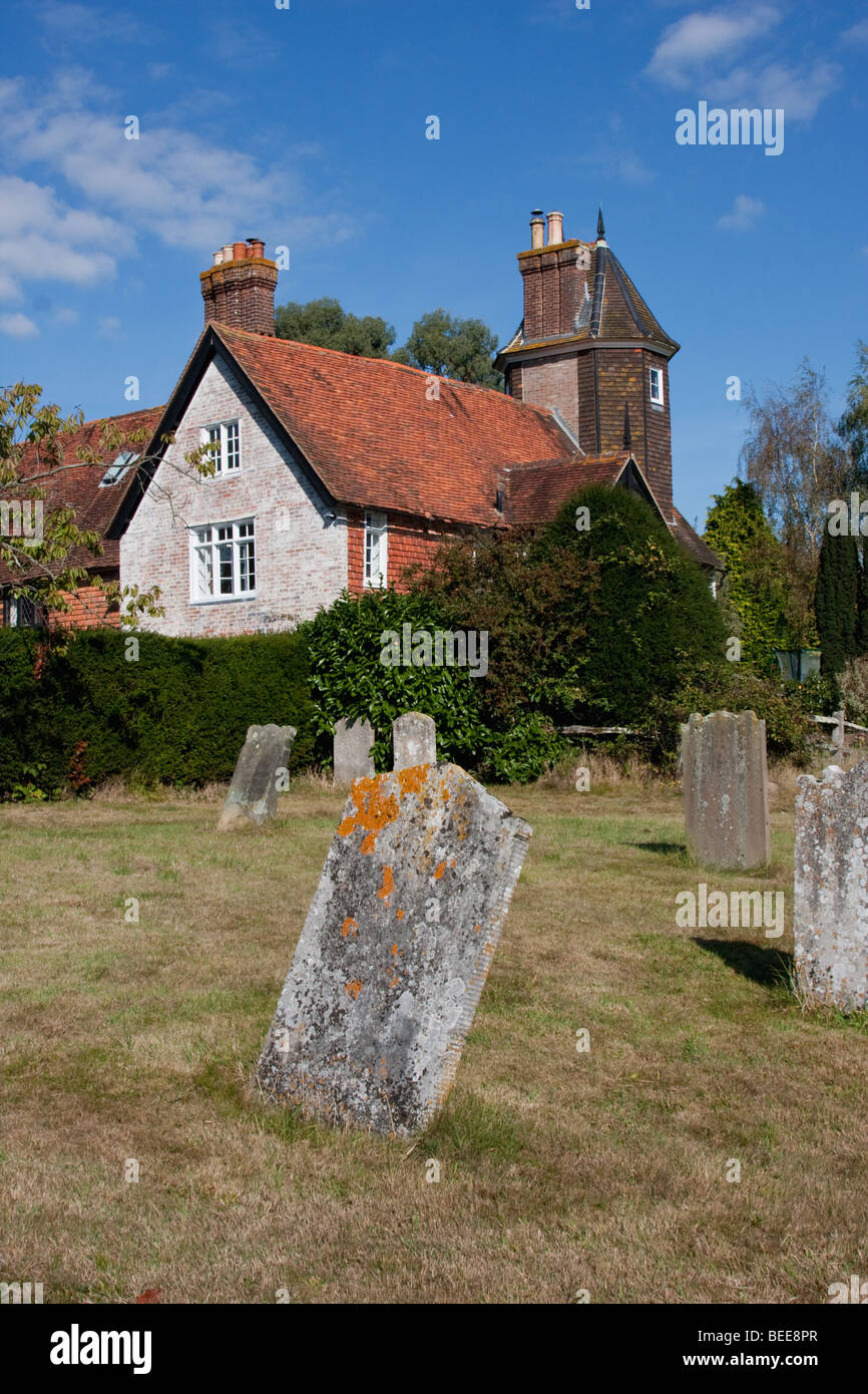Village churchyard with gravestones during day in Framfield Village in ...