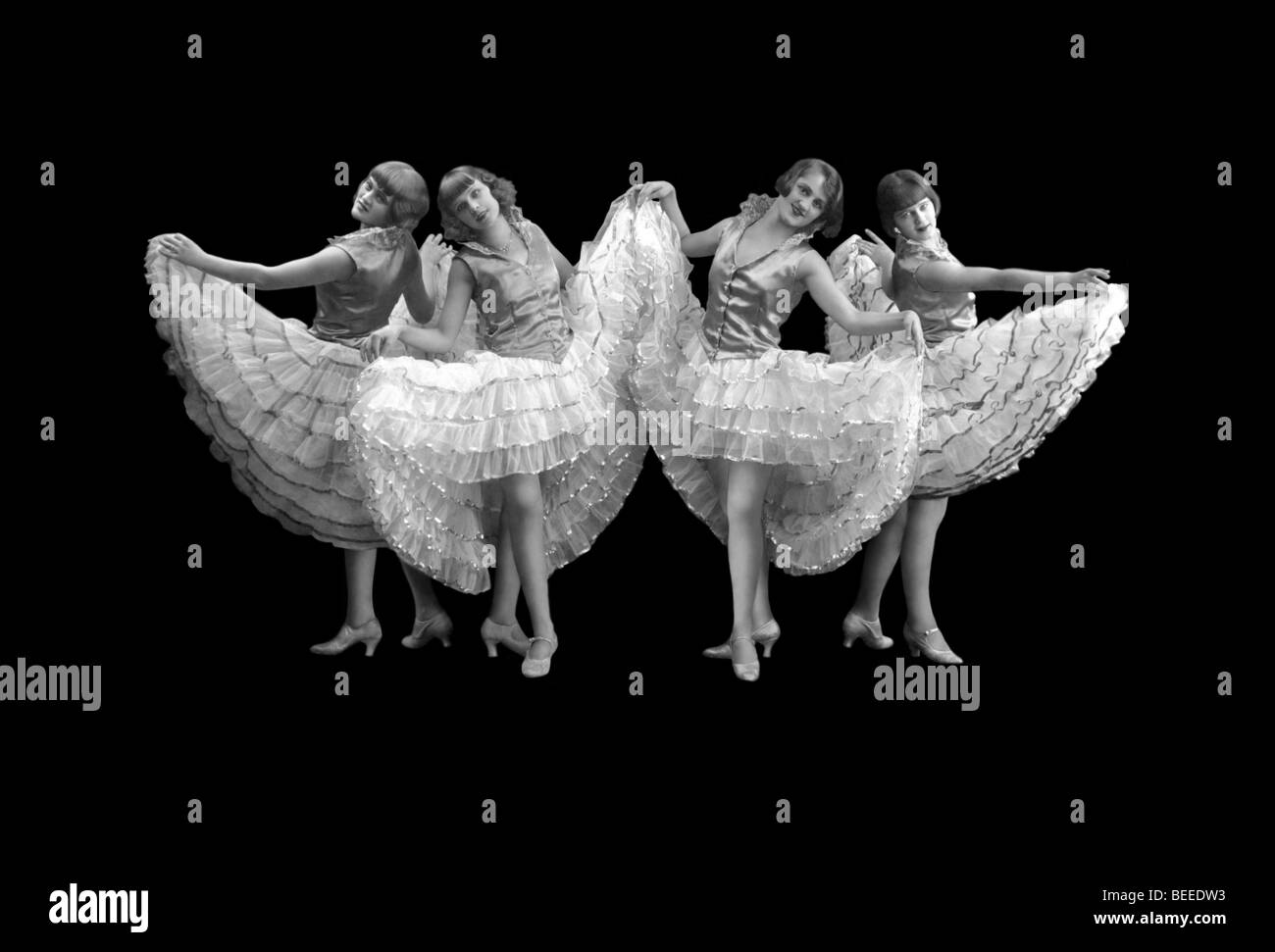 Historic photograph, four female dancers Stock Photo - Alamy