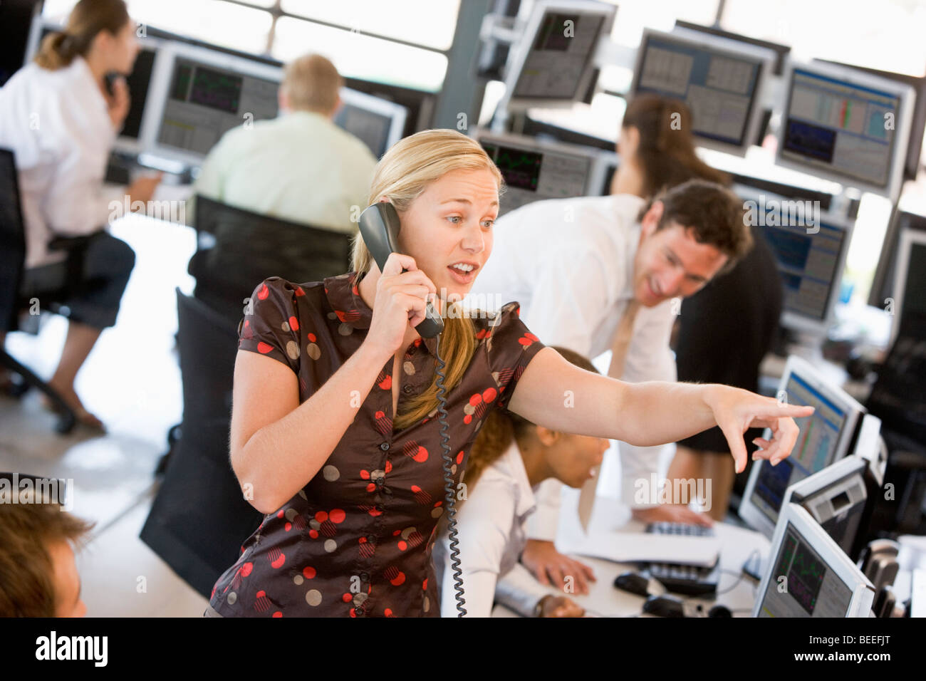 Stock broker phone hi-res stock photography and images - Alamy