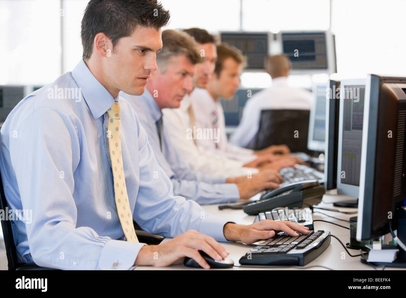 Stock Traders At Work Stock Photo - Alamy