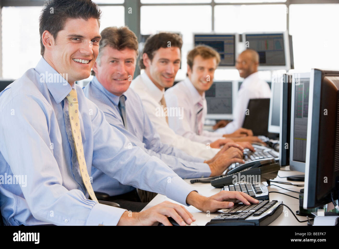 Stock Traders At Work Stock Photo - Alamy