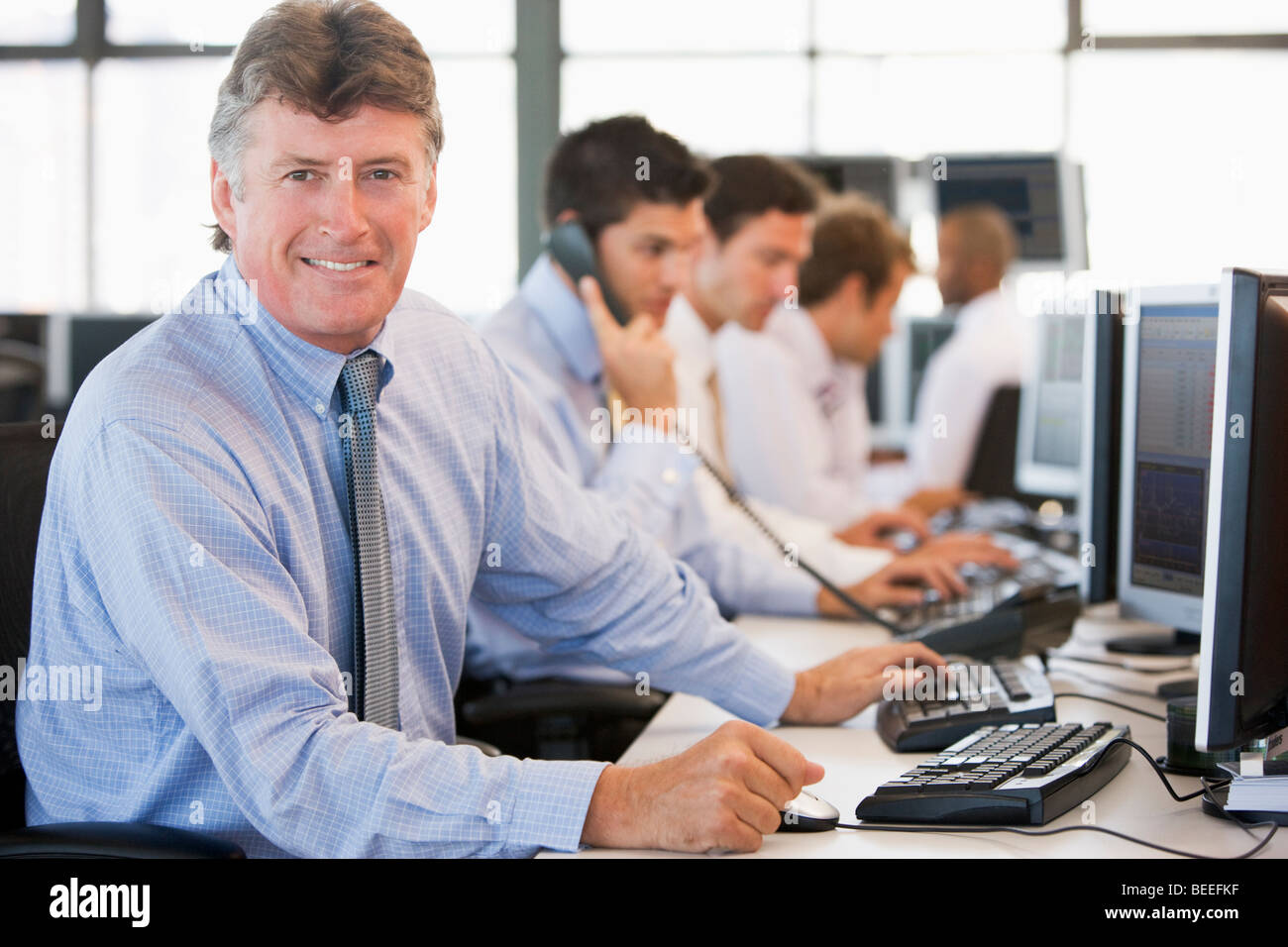Stock Traders At Work Stock Photo - Alamy