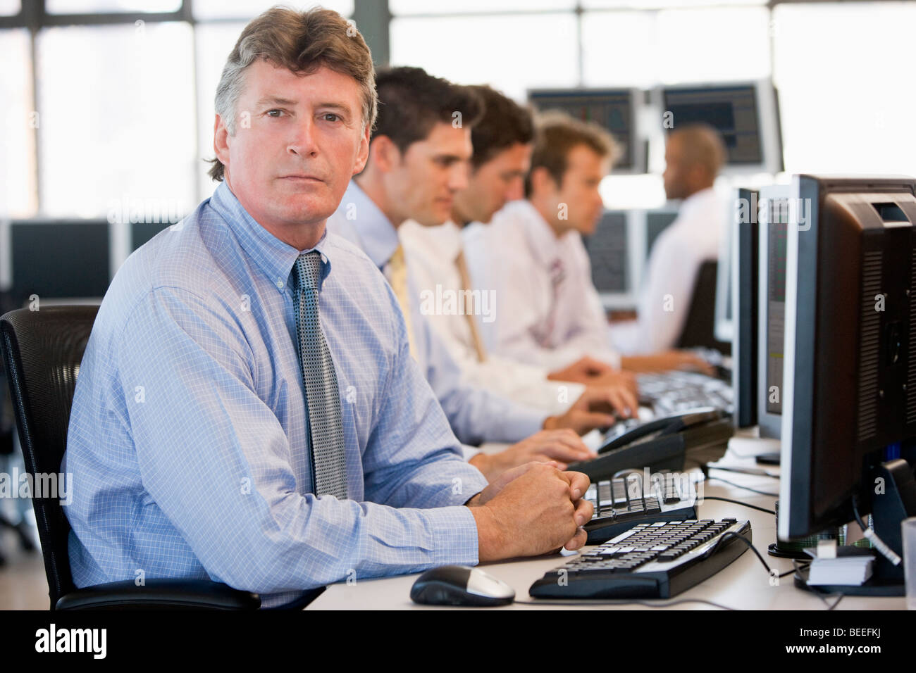 Stock Traders At Work Stock Photo - Alamy