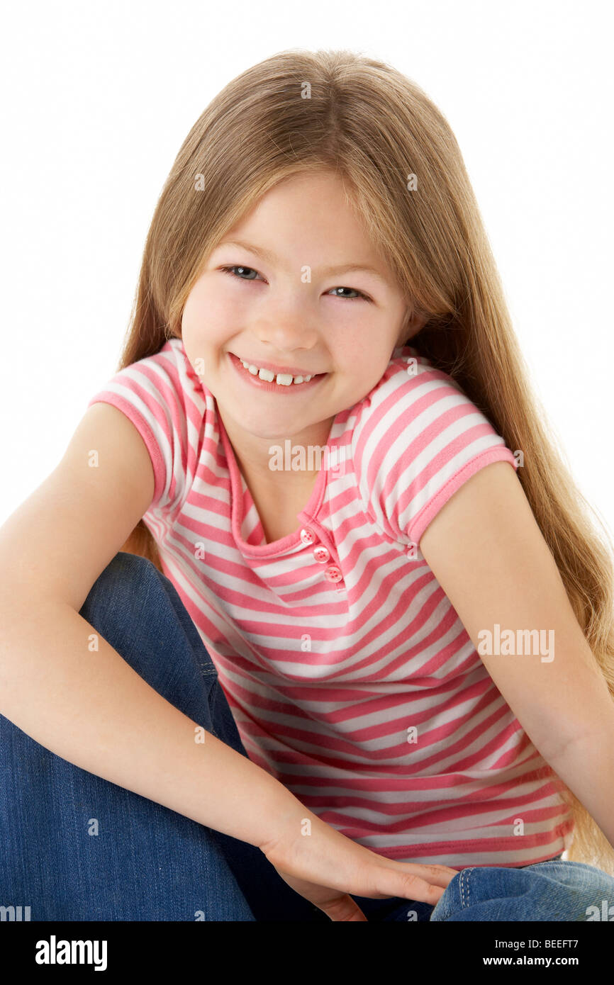Studio Portrait of Smiling Girl Stock Photo - Alamy