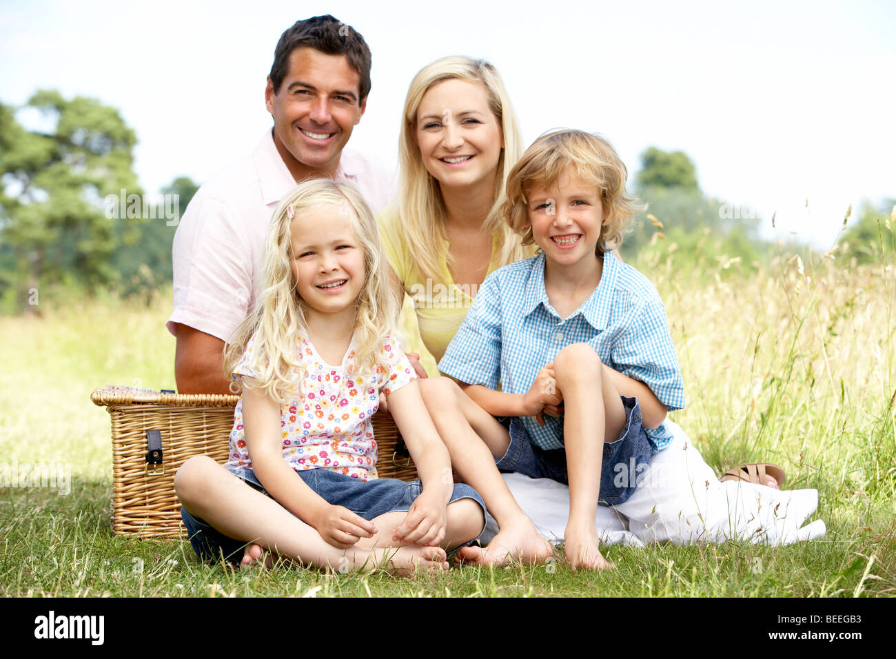 Family having picnic in countryside Stock Photo - Alamy