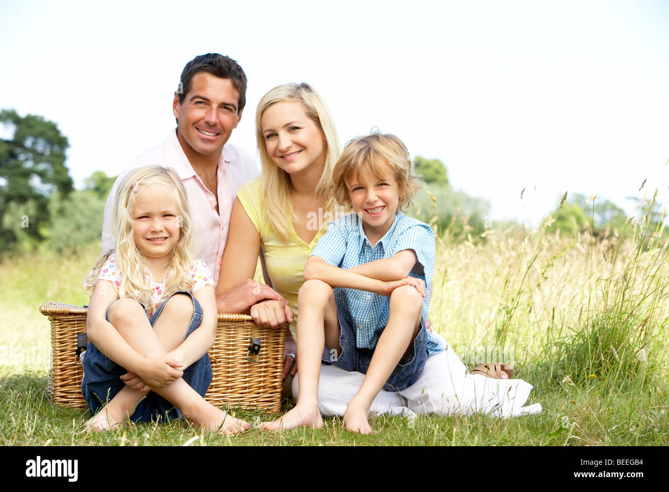 Family having picnic in countryside Stock Photo - Alamy