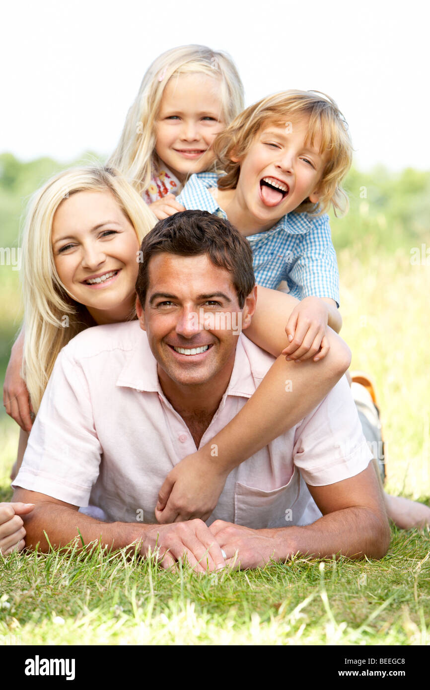Family having fun in countryside Stock Photo - Alamy