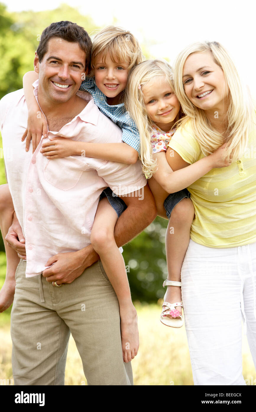 Family having fun in countryside Stock Photo - Alamy
