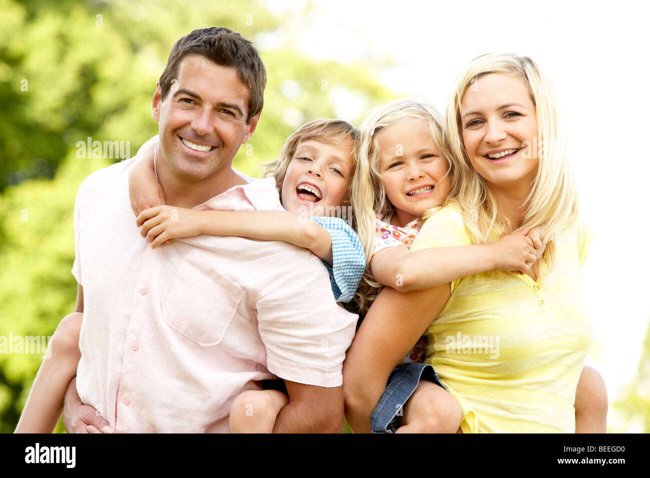 Family having fun in countryside Stock Photo - Alamy