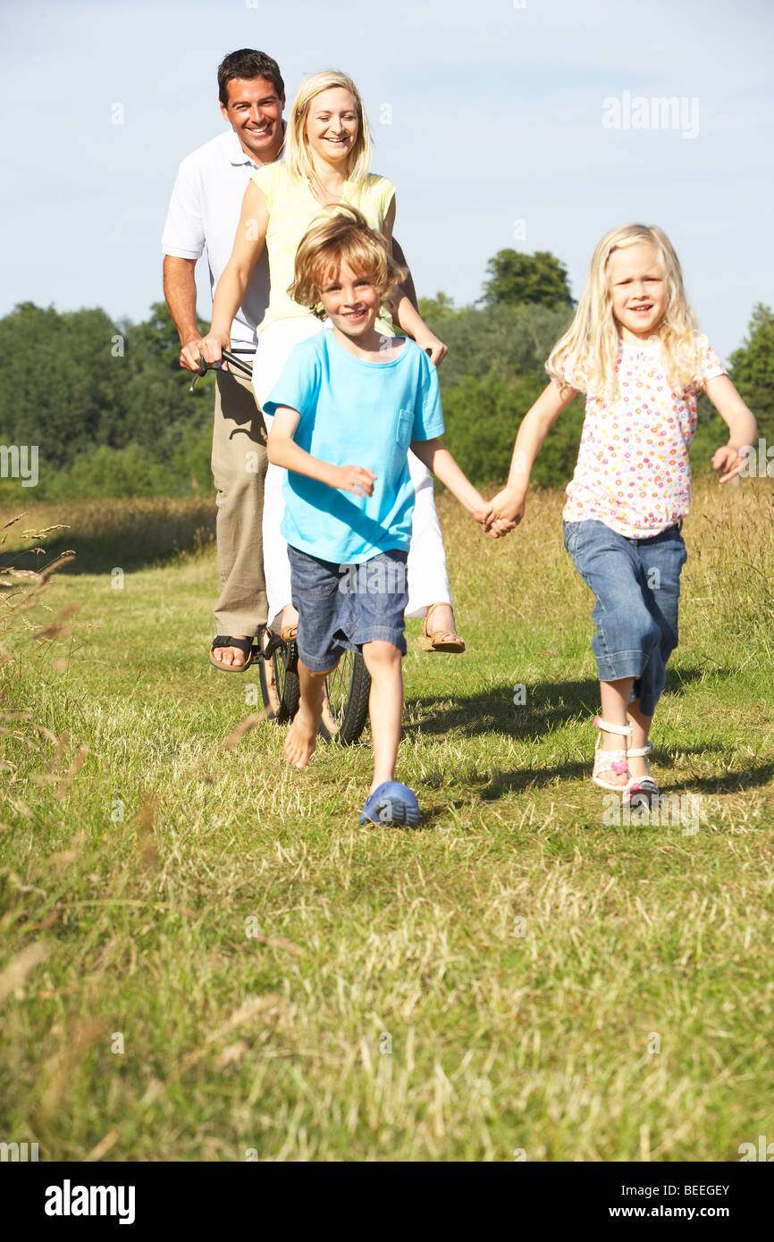 Family having fun in countryside Stock Photo - Alamy