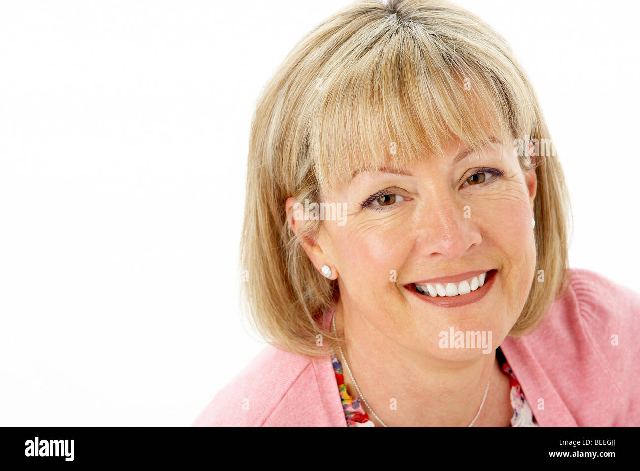 Studio Portrait of Smiling Mother Stock Photo - Alamy