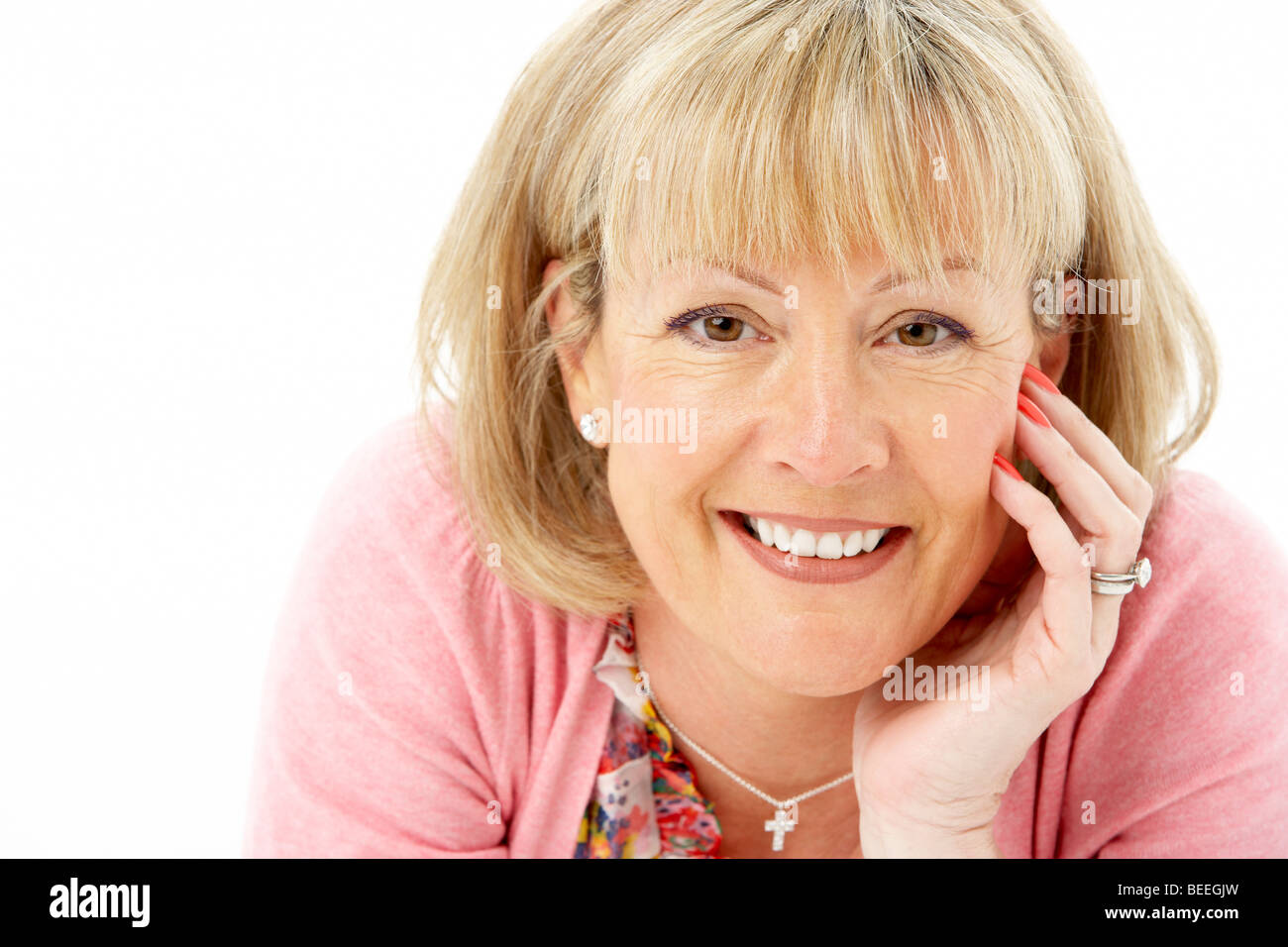 Studio Portrait of Smiling Mother Stock Photo - Alamy