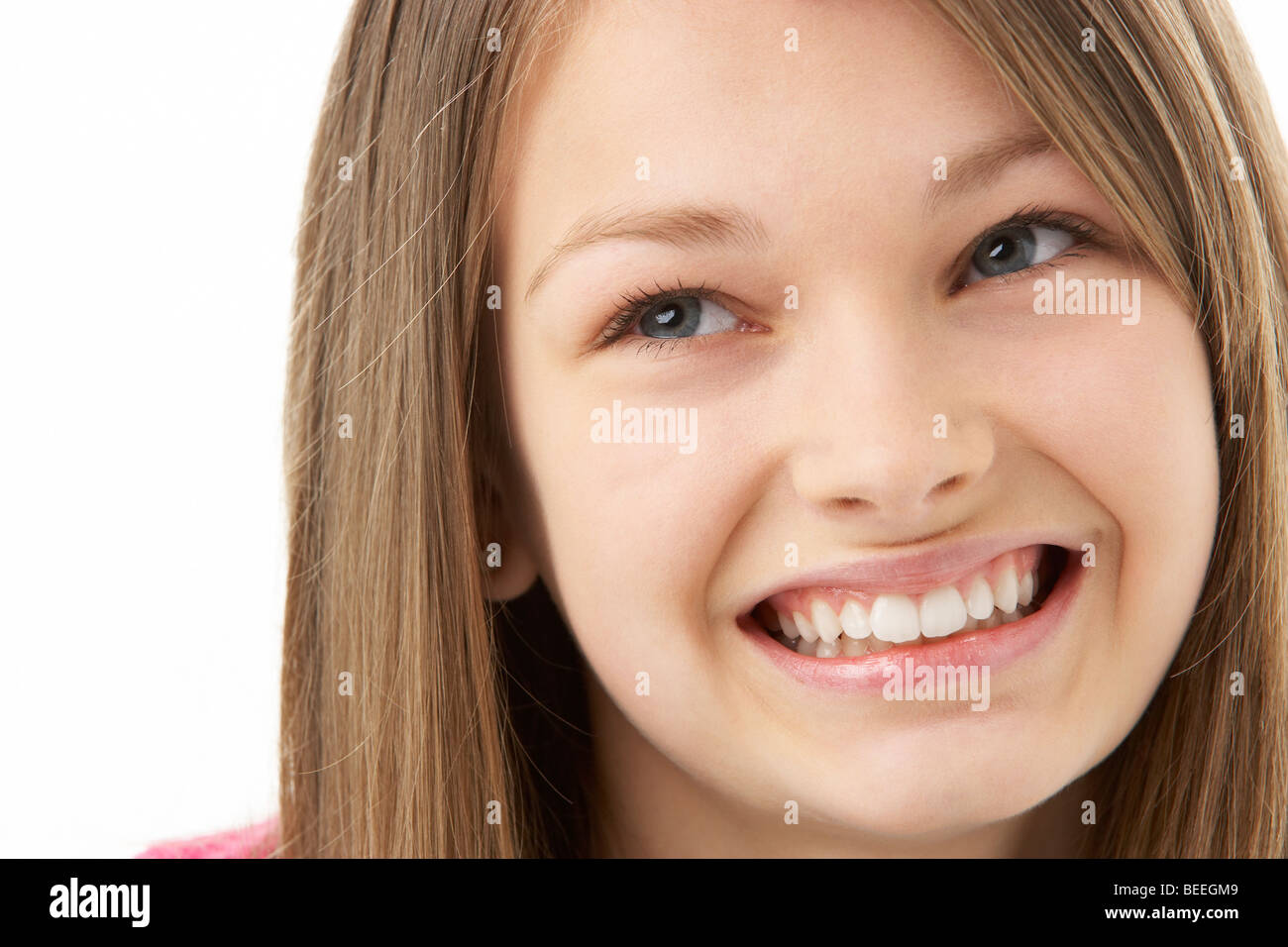 Studio Portrait of Smiling Teenage Girl Stock Photo - Alamy