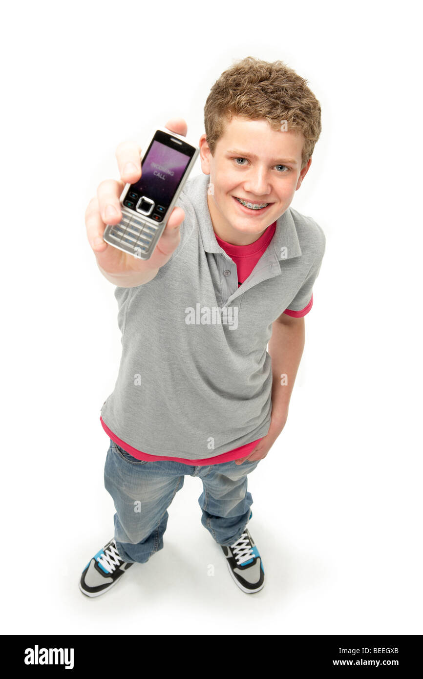 Portrait of Smiling Teenage Boy Holding Mobile Phone Stock Photo - Alamy