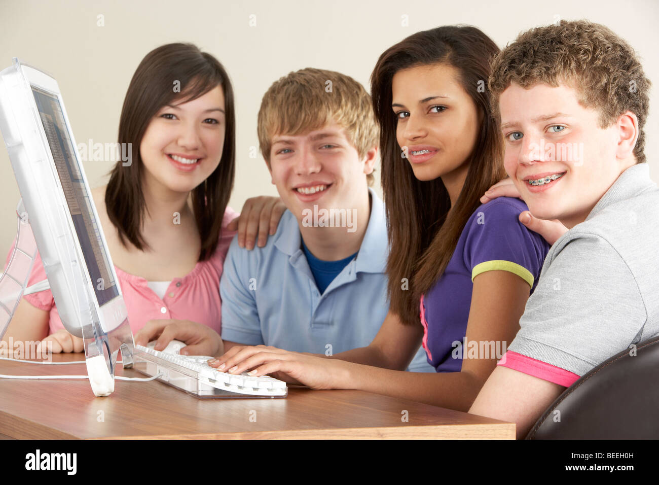 Teenagers on Computer at Home Stock Photo - Alamy