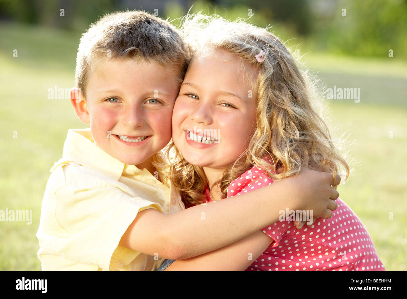 Children hugging hi-res stock photography and images - Alamy
