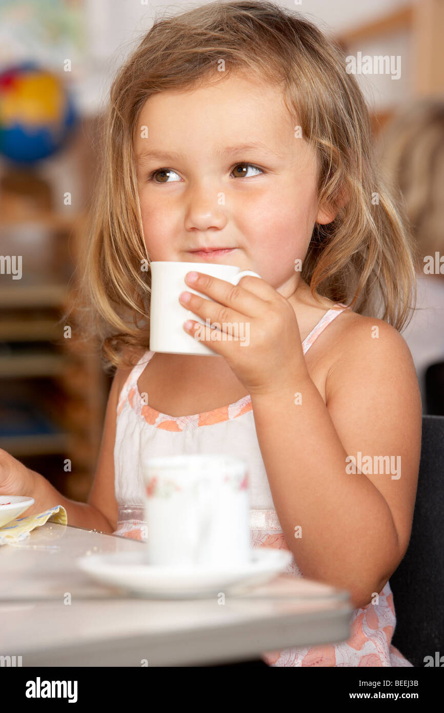 Young Boy Having Tea at Montessori/Pre-School Stock Photo - Alamy