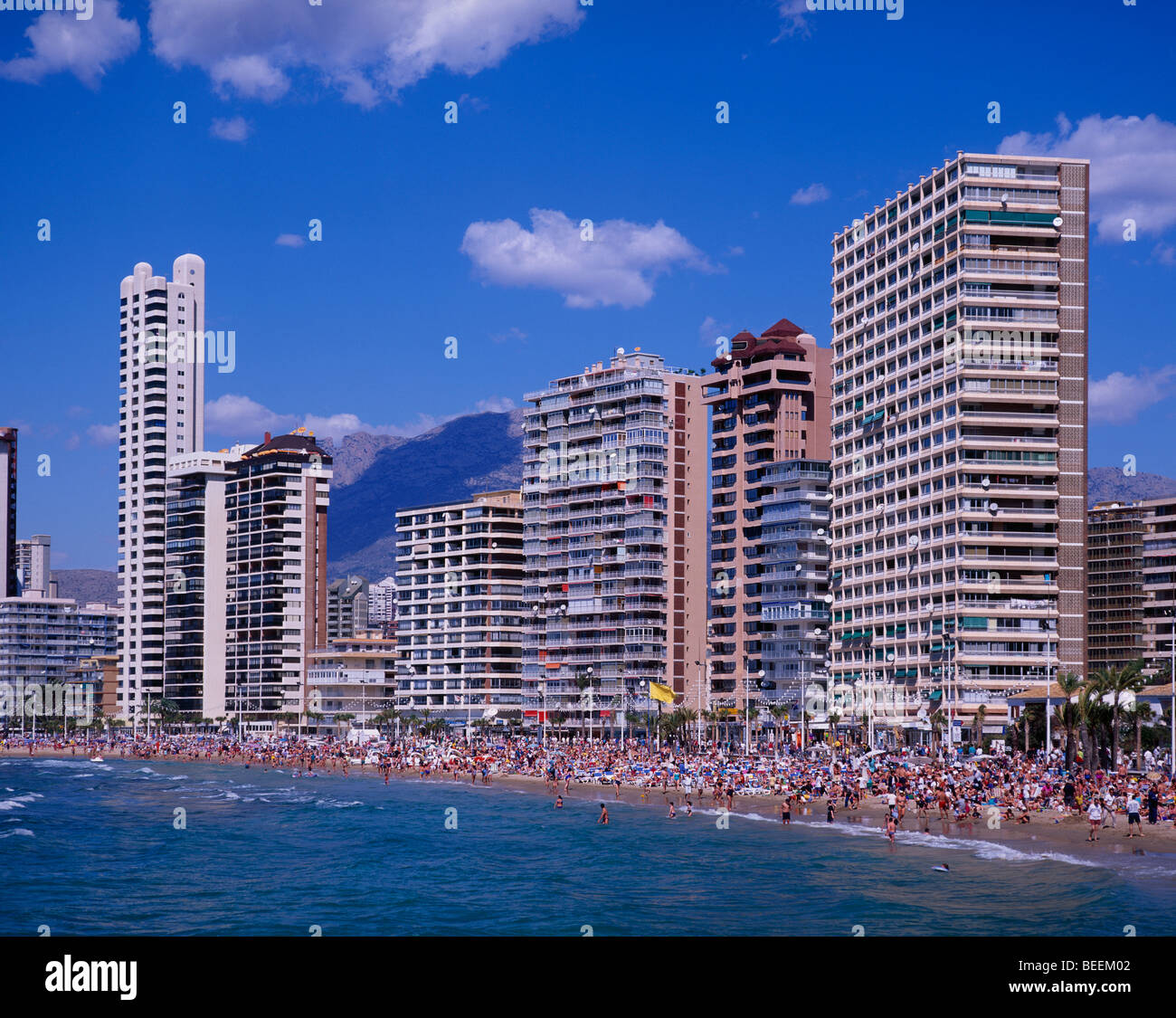 Mass tourism Levante beach Benidorm Spain Stock Photo - Alamy