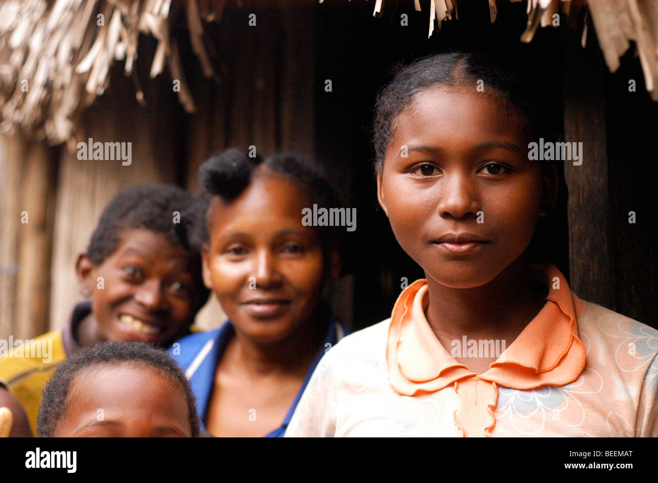 Madagascar - Young family outside their house in Ebakika Village Stock ...