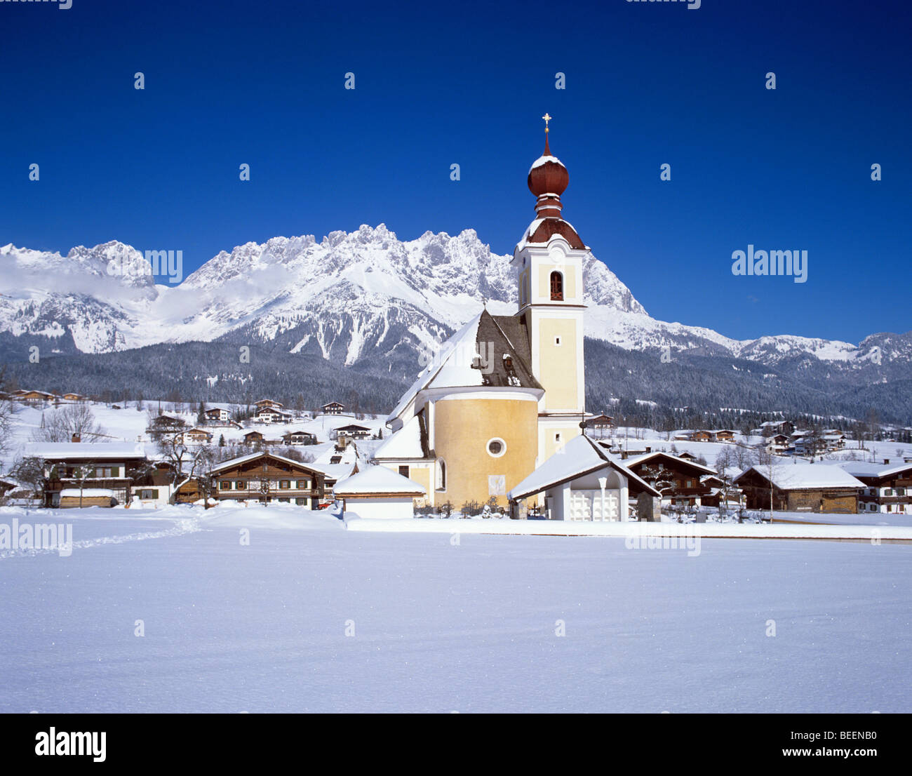 Winters view of the alpine village of Going showing the Wilder Kaiser ...