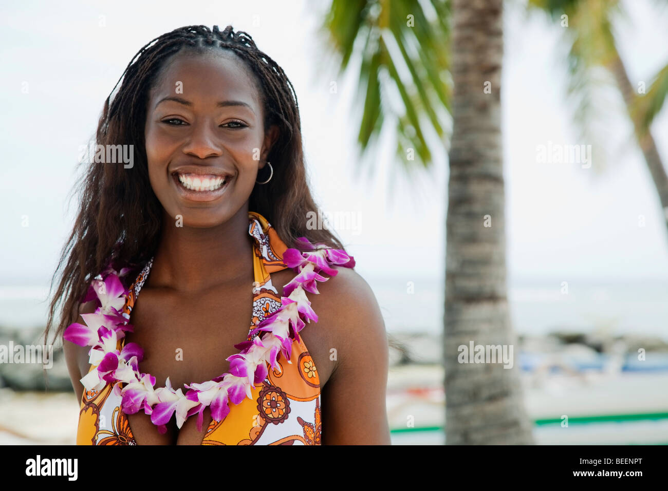 Young woman wearing lei hi-res stock photography and images - Alamy