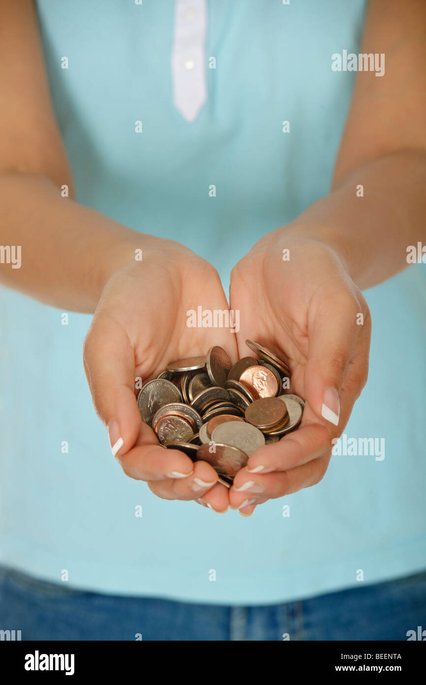 Hand full of coins hi-res stock photography and images - Alamy